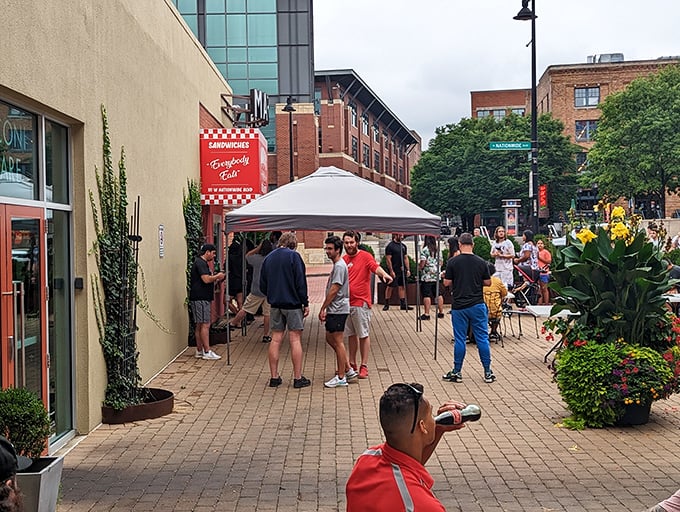 The line outside isn't just people waiting&mdash;it's a community formed by the universal language of "have you tried their cheesesteaks yet?"