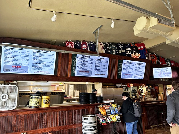 The bar area, where Philadelphia sports jerseys stand guard overhead like the patron saints of good eating and hometown pride.