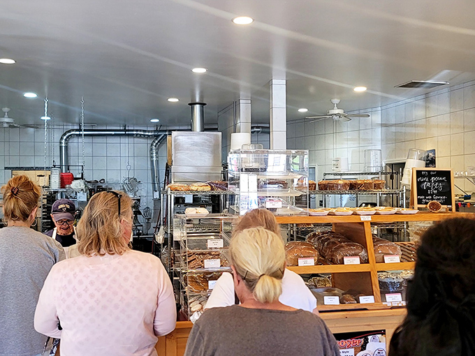 The universal language of anticipation&mdash;customers patiently waiting for their turn at happiness, united by the mutual understanding that some things are worth waiting for.