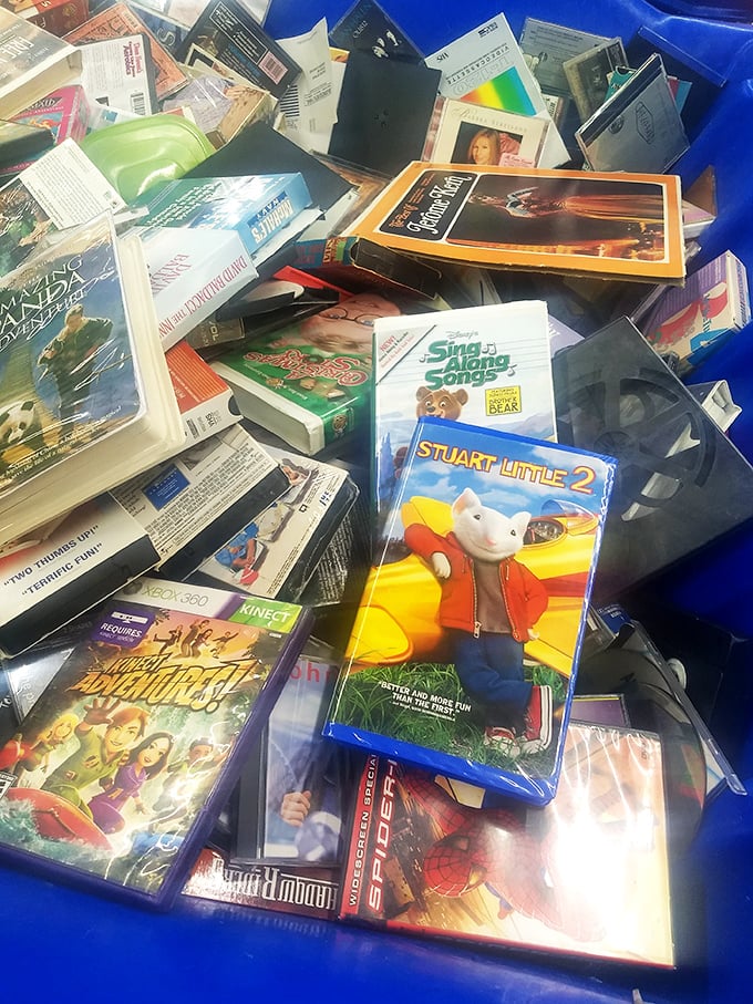 The media section: where Stuart Little 2 and forgotten Xbox games coexist in a nostalgic time capsule of entertainment history.