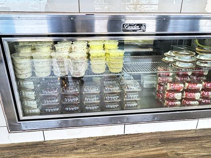 Cool, creamy desserts waiting patiently in their refrigerated display &ndash; because after a chicken adventure, your taste buds deserve a sweet epilogue.
