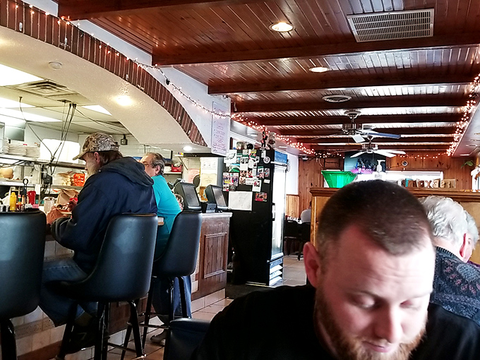 The counter is where the real diner magic happens. Regular customers become family, and coffee refills appear before you even ask.