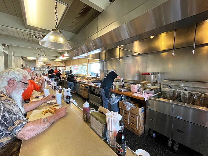 The gleaming stainless steel kitchen is like watching a well-choreographed dance&mdash;if the dancers were making delicious hot dogs instead of pirouettes.