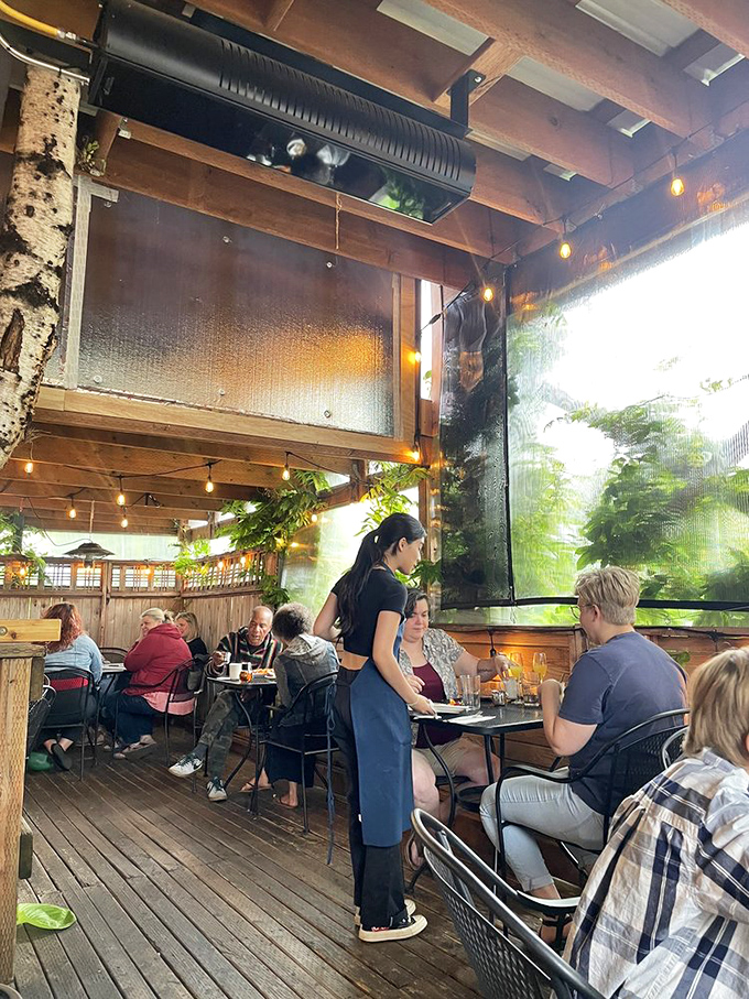 The outdoor seating area, where string lights and climbing plants create the perfect backdrop for lingering over that second cup of coffee. 