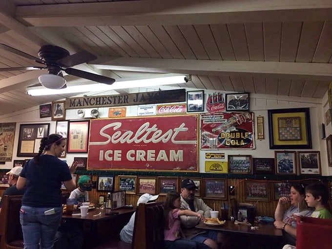 Locals gather under the glow of vintage signs, proving that good food and genuine community will always trump trendy dining concepts.