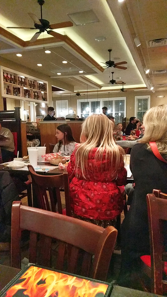 Where barbecue memories are made: families gathering around tables while the aroma of smoked meats creates the soundtrack to happiness.