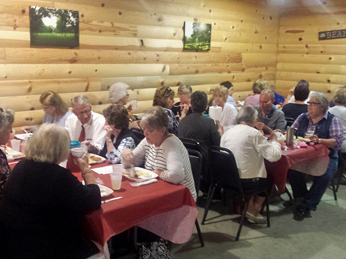 These diners aren't just eating lunch; they're participating in a community tradition. Notice how nobody's looking at their phones&mdash;the food demands full attention.