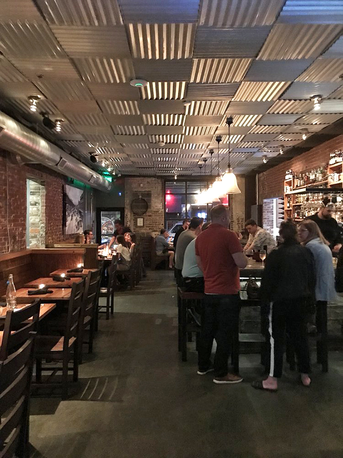 The harvest salad that makes you feel virtuous enough to order dessert—quinoa, roasted squash, and greens playing nicely together.