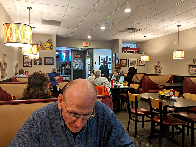 The true measure of a great diner isn't just its menu, but the cross-section of humanity it attracts, from retirees to families to solo newspaper readers.