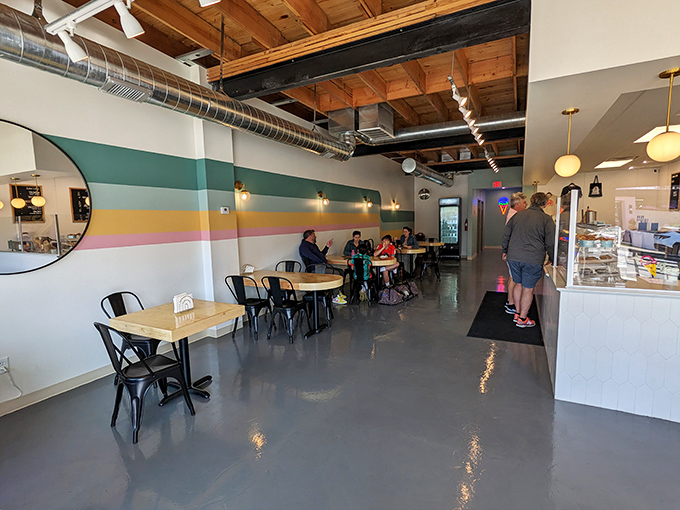 Ice cream brings strangers together in silent agreement: life's problems can wait until after the last spoonful disappears.