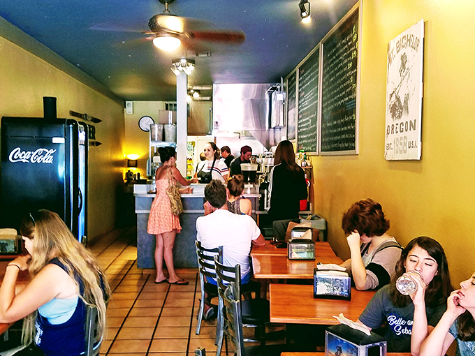 The outdoor seating area offers prime people-watching with your prime sandwich. Urban dining with a side of Bend's charming streetscape.