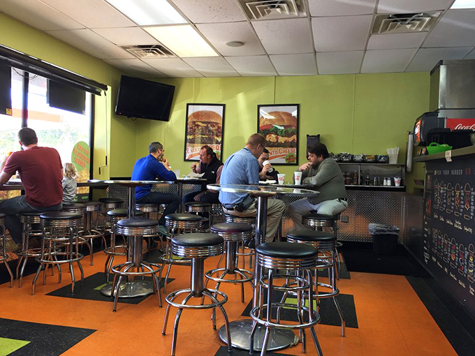Lunchtime at Big Burger Spot&mdash;where strangers become united in the universal language of "mmm" and "pass the napkins, please."