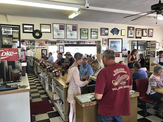 McClard's dining room buzzes with the universal language of barbecue appreciation&mdash;the sound of happy people making involuntary "yum" noises.