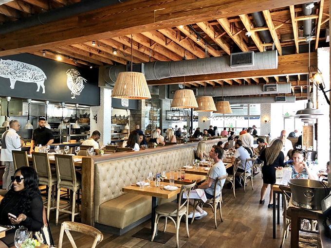 The bustling dining room hums with satisfaction. Those exposed beams have witnessed countless "first bite" faces of pure joy.