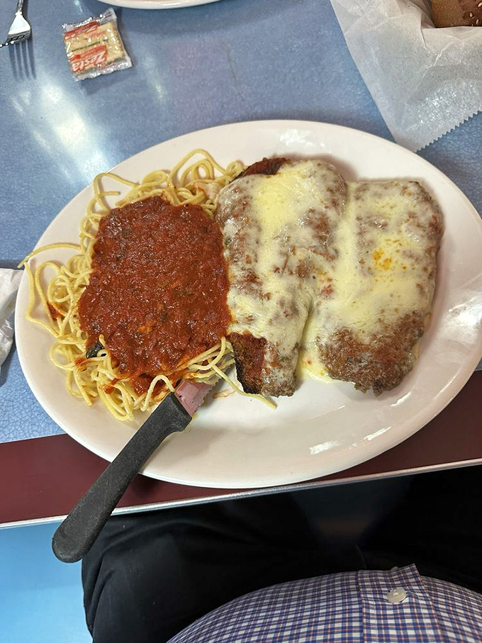 Italian-American comfort on a plate. That red sauce has probably been simmering since yesterday, and we're all better for it.