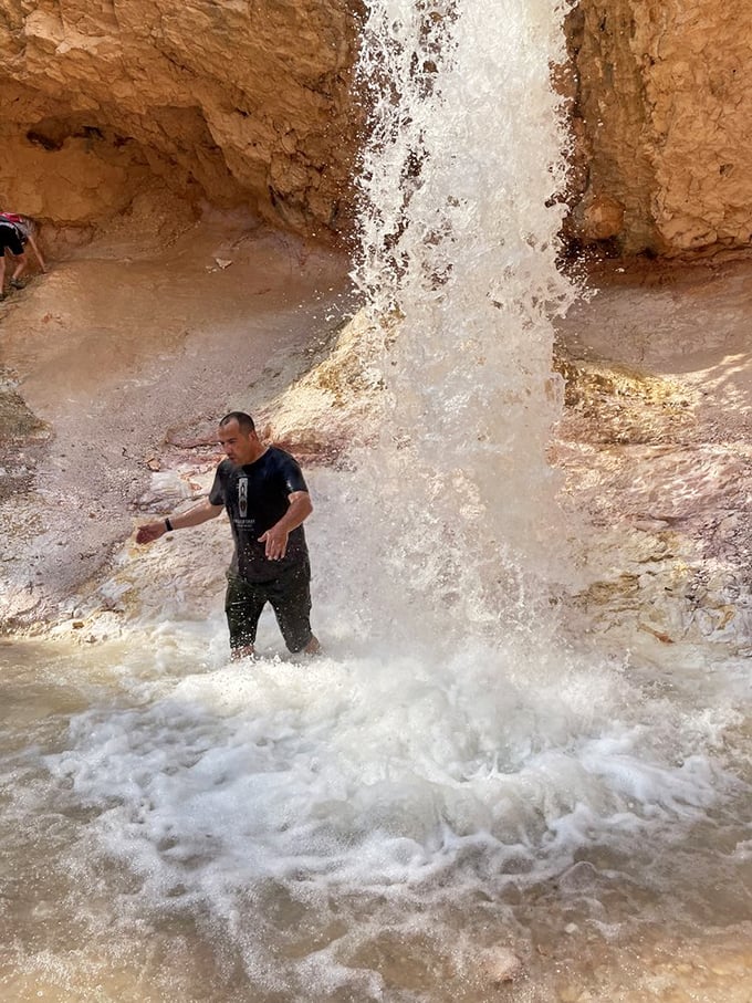 Getting up close and personal with the waterfall&mdash;nature's version of a splash zone that doesn't require a poncho purchase.