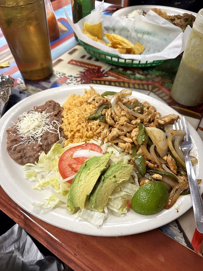 Fajita de Pollo: where chicken achieves its highest purpose. That lime wedge isn't just garnish&mdash;it's the finishing touch on a masterpiece.