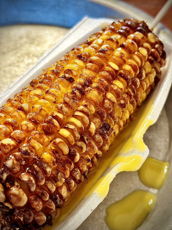 Grilled corn on the cob swimming in melted butter&mdash;nature's perfect food made even more perfect by fire and dairy.