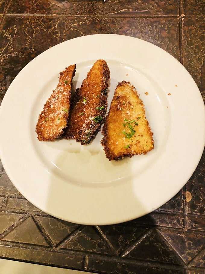 Golden-fried zucchini triangles that make you wonder why vegetables ever bothered trying to be healthy in the first place.