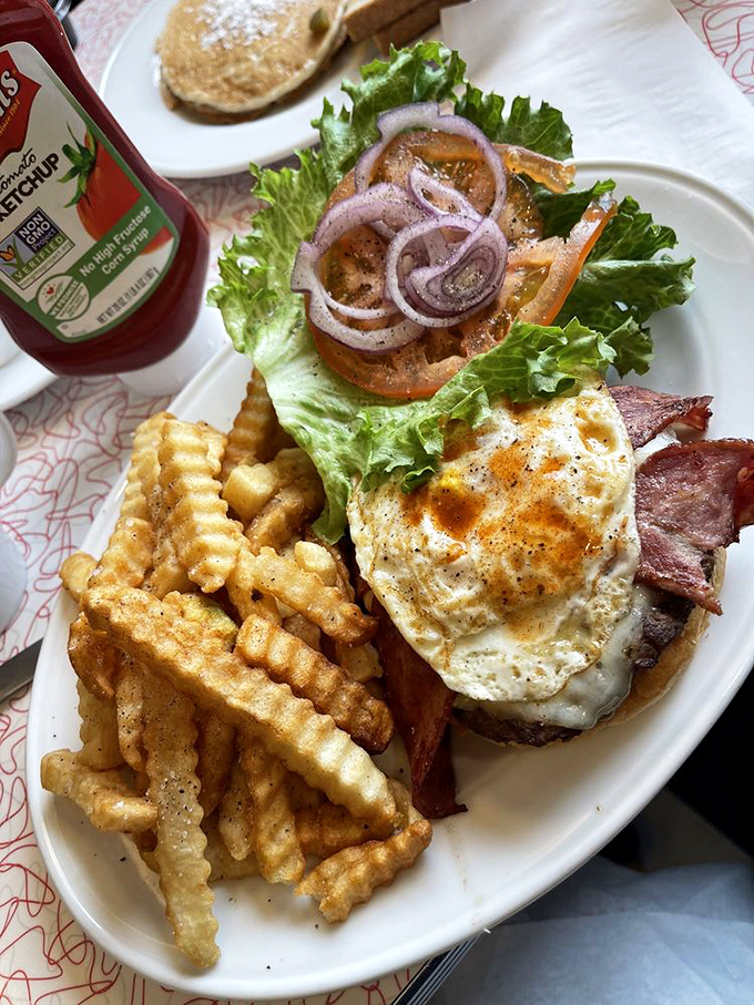 This isn't just a burger&mdash;it's architecture. The perfectly fried egg on top creates a sauce that no condiment could ever hope to match.