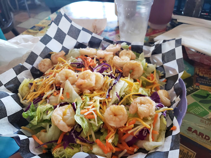 This isn't just a salad&mdash;it's a shrimp party where lettuce and vegetables somehow scored an invitation.