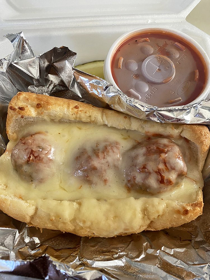 Three perfectly seasoned meatballs nestled in a blanket of melted cheese. This sandwich doesn't need to show off&mdash;it knows exactly what it is.