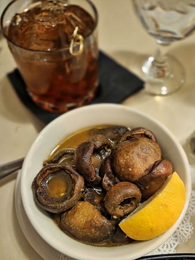 Mushrooms swimming in garlicky wine sauce that demands bread for sopping. These earthy morsels provide the perfect umami counterpoint to your beefy main event.