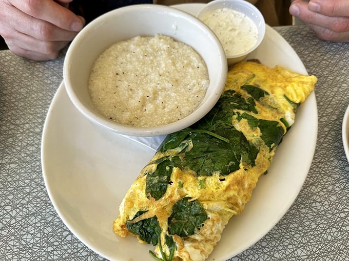 A proper omelet should be a canvas for vegetables, not just a yellow envelope. This spinach creation shows why simplicity often trumps culinary showboating.
