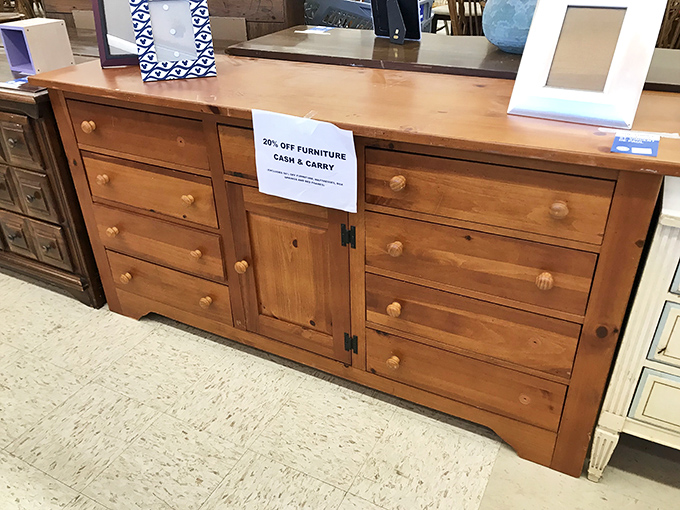 This pine dresser offers storage with rustic charm at a fraction of retail prices&mdash;the "20% off" sign is just the cherry on top.