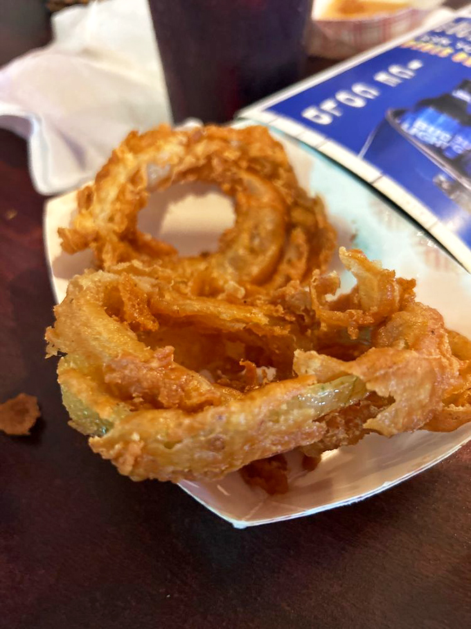Onion rings so perfectly golden and crispy, they should be wearing Olympic medals. The supporting actors that sometimes steal the whole show.