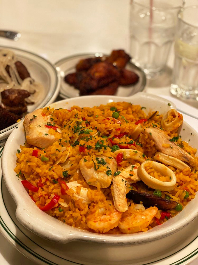 This paella isn't just dinner&mdash;it's a colorful fiesta where seafood, chicken, and saffron rice have gathered to celebrate in your mouth.