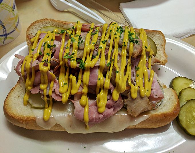 The sandwich equivalent of a standing ovation&mdash;layers of meat and cheese with mustard zigzagged across the top like edible autographs. 