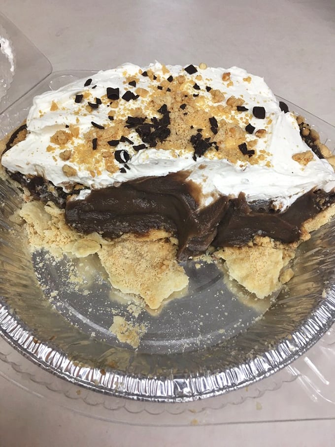Chocolate and peanut butter: the power couple of desserts. This pie transforms America's favorite flavor combination into a slice of pure decadence.