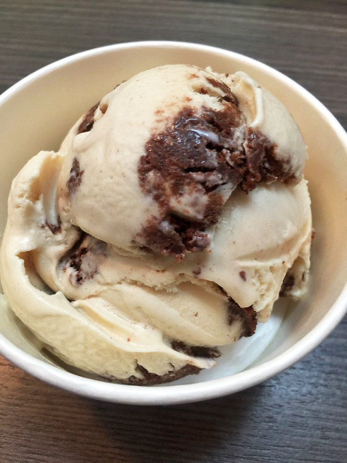 Three scoops of chocolate variations lined up like old friends at a reunion. Different personalities, same delicious family. 