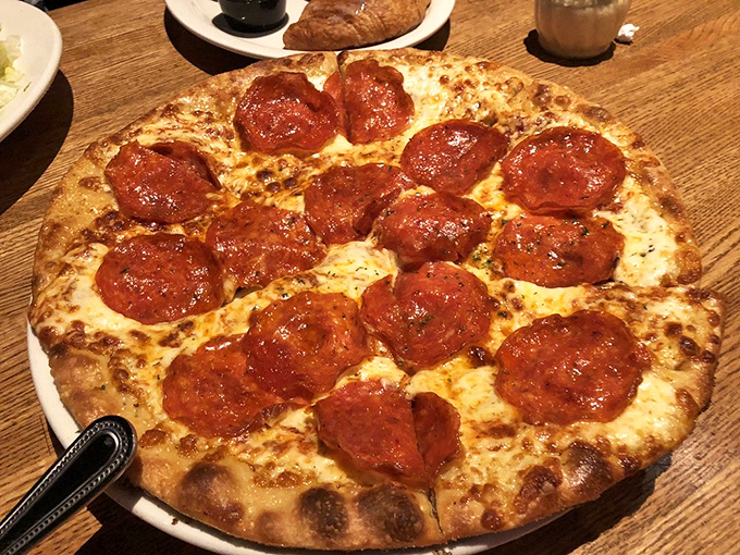 A pepperoni pizza so perfectly executed it makes you question why you ever ordered anything else. Those crispy edges are where flavor goes to party.