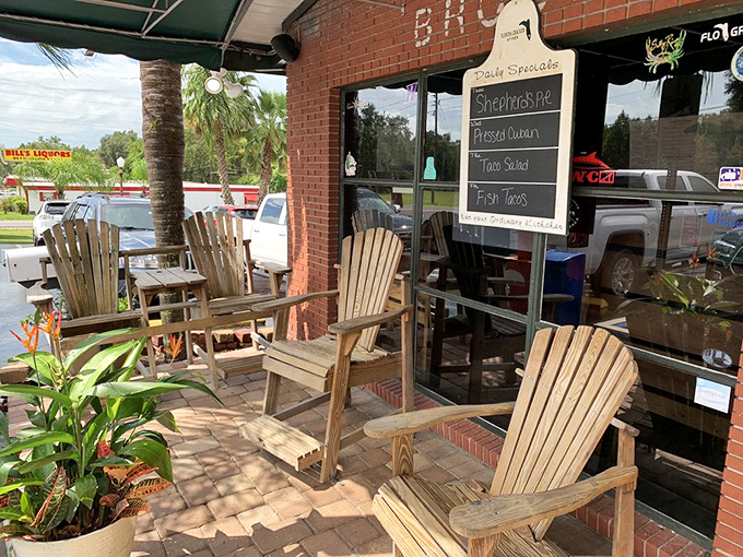 Adirondack chairs on the porch invite you to sit a spell. Southern hospitality doesn't get more literal than this front-porch welcome.