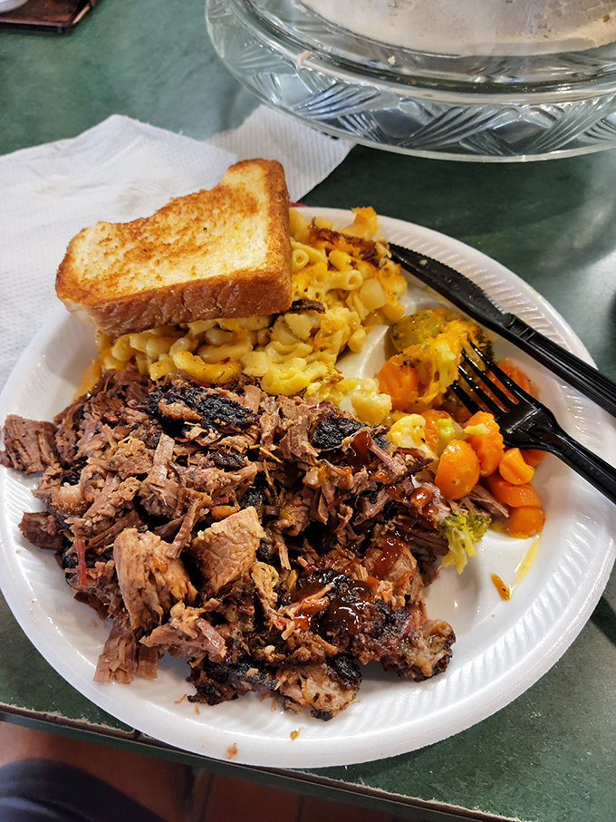 This isn't just pulled pork&mdash;it's a Southern sermon on a plate, with mac and cheese and carrots as the choir. Hallelujah!