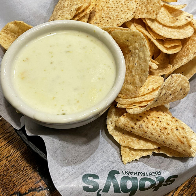 Cheese dip so legendary it deserves its own Arkansas license plate, served with chips sturdy enough to handle the heavy lifting.