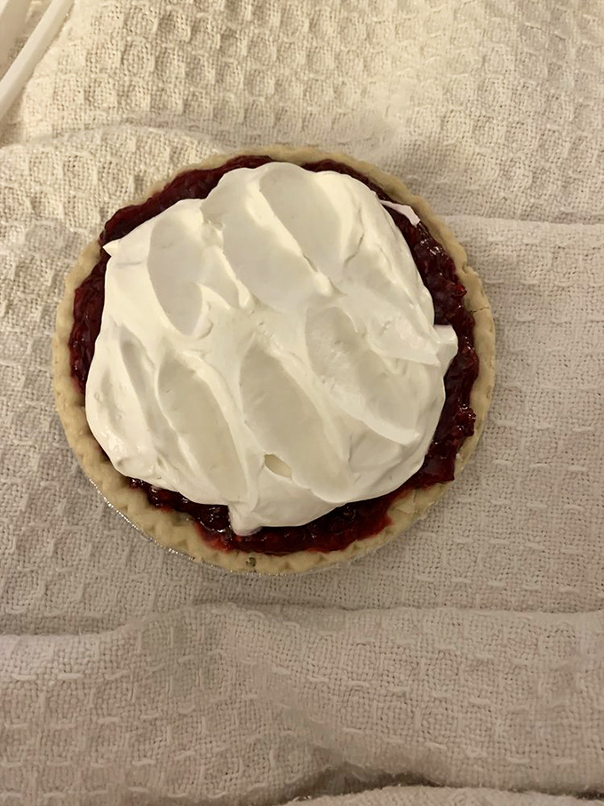 A mini berry delight that proves good things come in small packages. The cream-to-filling ratio is what mathematicians call "perfect."