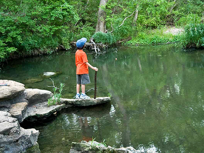 Huck Finn would approve of this fishing spot, where kids still experience the timeless joy of doing absolutely nothing by the water.