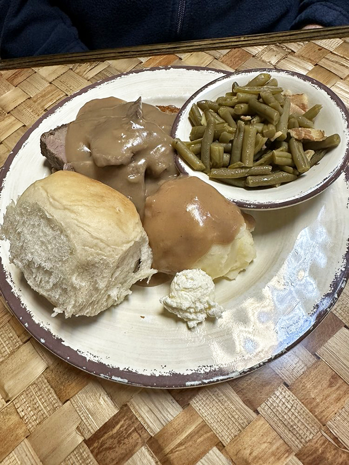 A plate that answers the eternal question: "What does comfort look like?" Turns out, it's roast beef, green beans, and rolls that could make angels weep.