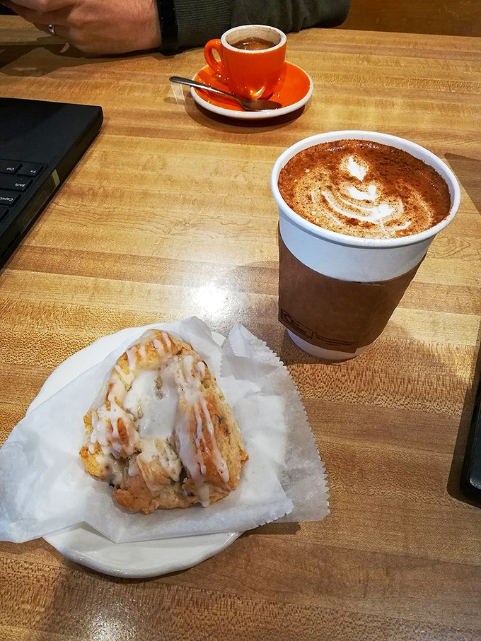 The sweet glaze on this scone is doing that thing where it winks at you and whispers, "Diet? What diet?"