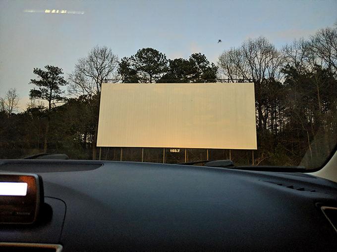 The blank screen at dusk holds infinite possibilities&mdash;it's not just a movie, it's anticipation on a massive scale.