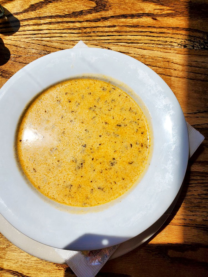 A velvety seafood bisque that carries whispers of the Atlantic in every spoonful &ndash; liquid gold for coastal food lovers.