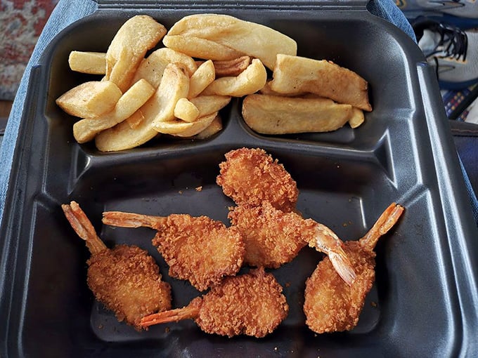 Golden-fried shrimp that crunch like autumn leaves, paired with hand-cut fries that put fast food potatoes to shame.