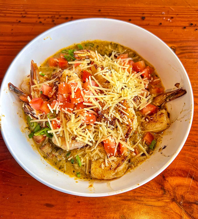 Shrimp and grits&mdash;the dish that makes Northerners finally understand why Southerners talk about grits with religious reverence. Cheesy, creamy perfection.