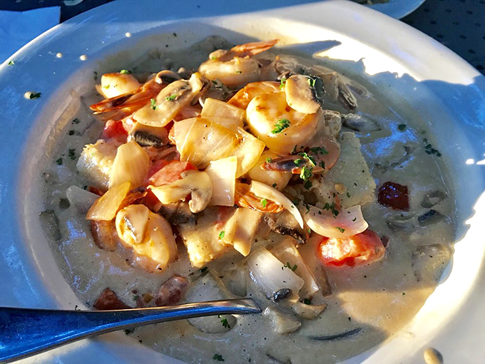 Shrimp and grits that would make a Southern grandmother nod in approval. Creamy, savory, with plump shrimp that practically dance in the broth.