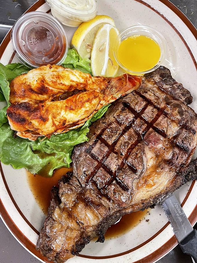 Surf meets turf in the ultimate food diplomacy. That perfectly grilled steak and succulent lobster tail have negotiated the most delicious peace treaty.
