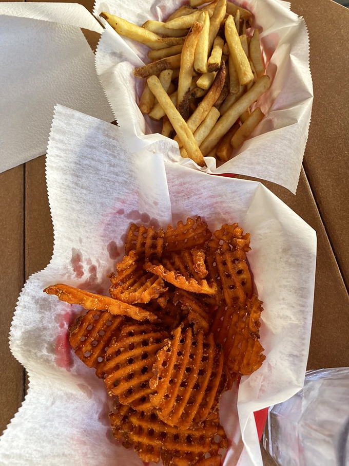 Waffle-cut sweet potato fries bring textural intrigue to the table, while regular fries provide that classic, comforting crunch we all secretly crave.