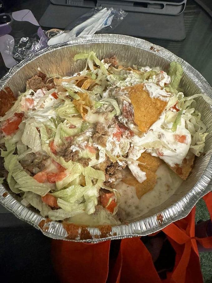 Supreme nachos that require a search party to find the chips beneath the mountain of toppings. Sharing optional but not recommended.